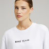 T-SHIRT DRESS WITH FEATHERS | BAÉ team in white